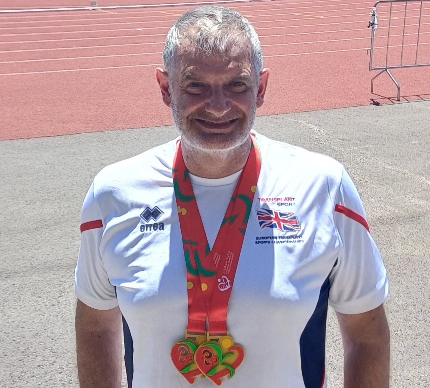 Bolton NHS worker celebrates heart transplant anniversary with gold medals